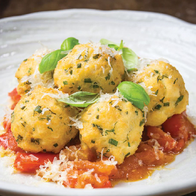 Bread and Grana Padano croquettes with fresh herbs, tomato and red ...