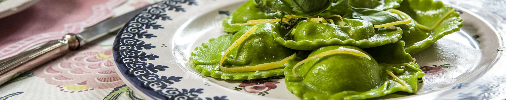 Green ravioli with fresh herb ricotta - Grana Padano